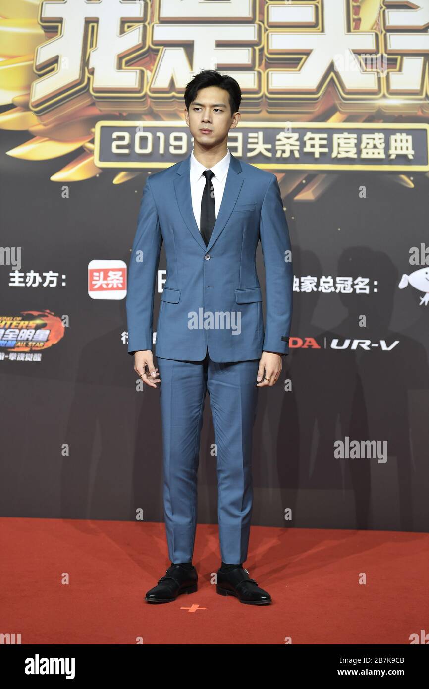 Chinese actor Li Xian attends 2019 Jinri Toutiao Fashion Gala in ...