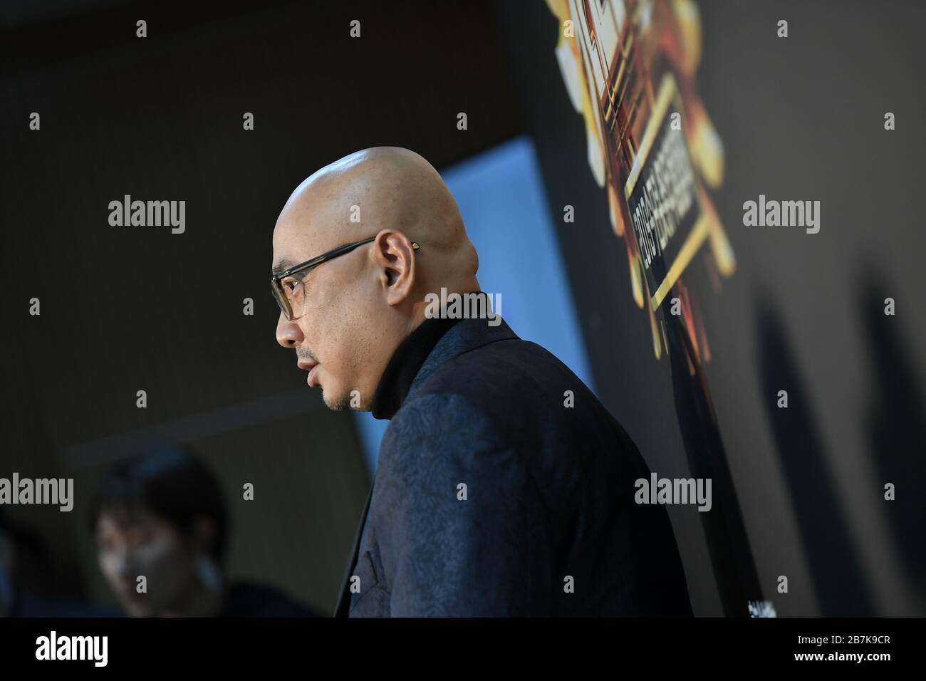 Chinese actor and director Xu Zheng shows up in black suit at Jinri ...