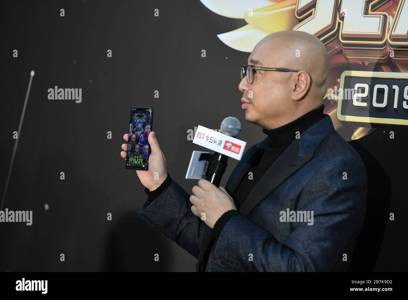 Chinese actor and director Xu Zheng shows up in black suit at Jinri ...