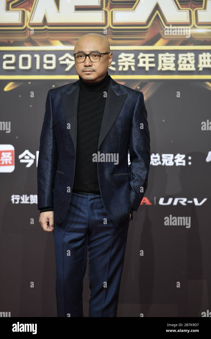 Chinese actor and director Xu Zheng shows up in black suit at Jinri ...