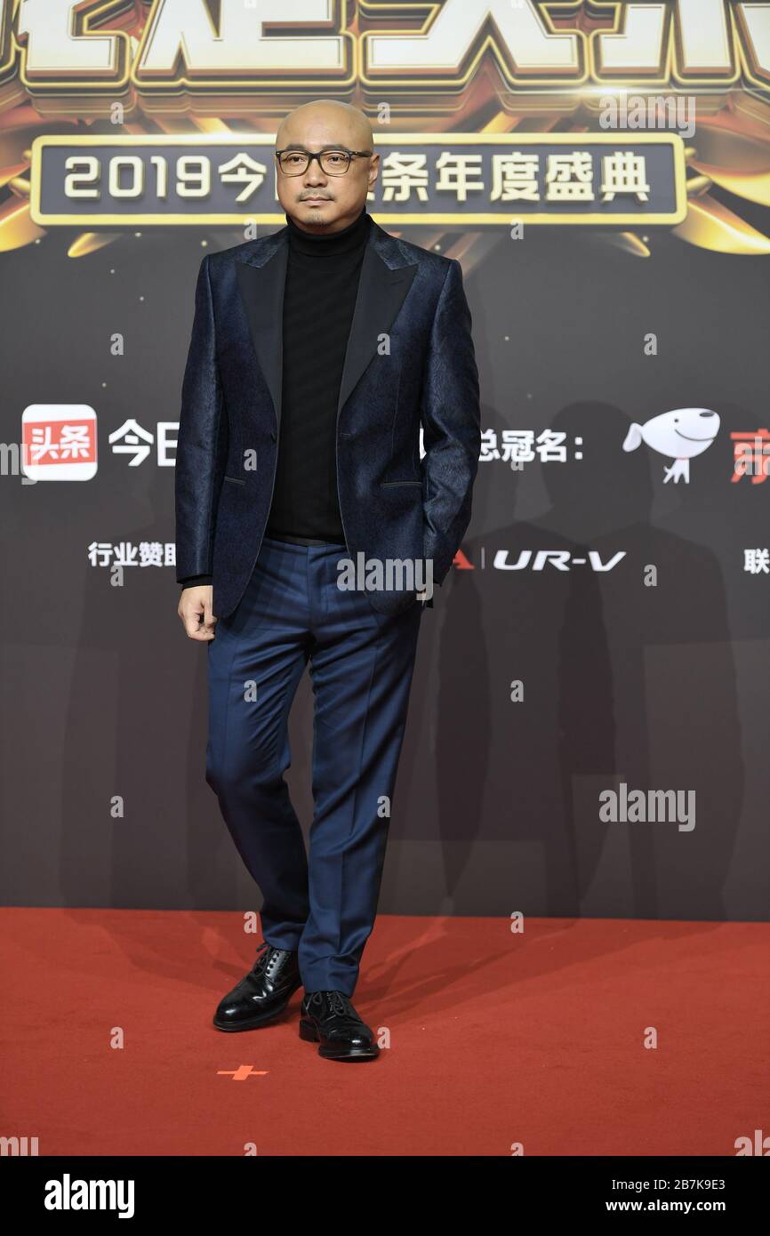 Chinese actor and director Xu Zheng shows up in black suit at Jinri ...