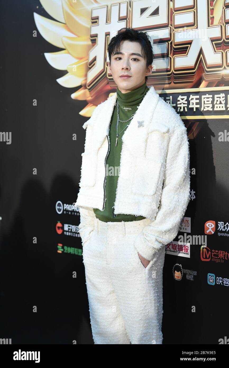 Chinese mainland pop male singer Liu Yuning shows up in white suit at ...