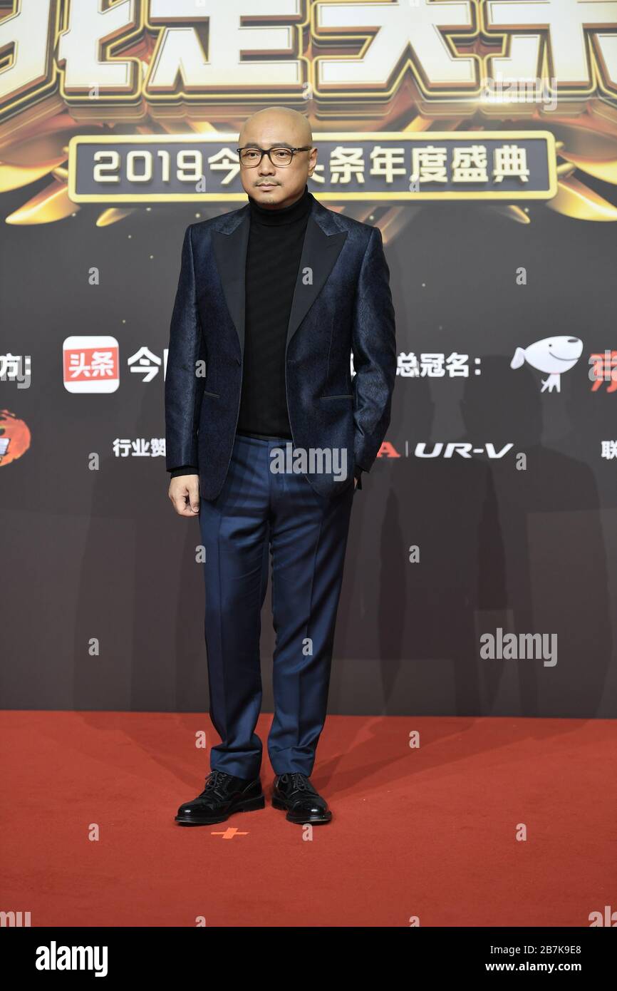 Chinese actor and director Xu Zheng shows up in black suit at Jinri ...