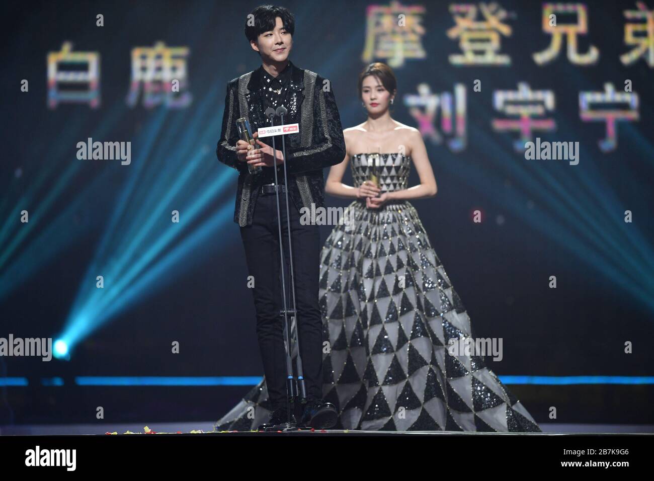 Chinese mainland pop male singer, actor, and the lead singer of Modern Brothers Liu Yuning, left ...