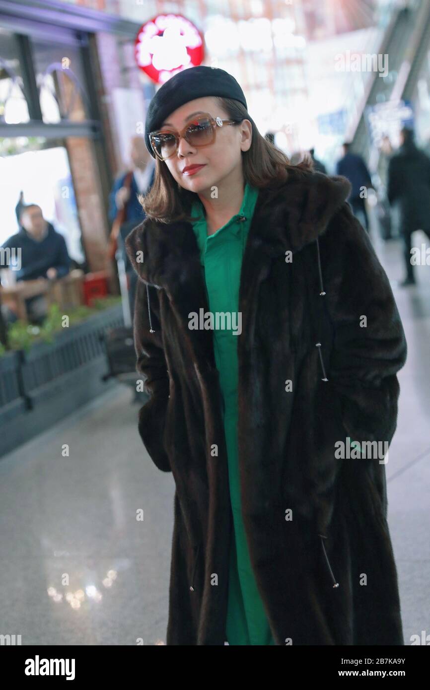 Hong Kong actress Sheren Tang shows up at a Beijing airport before ...