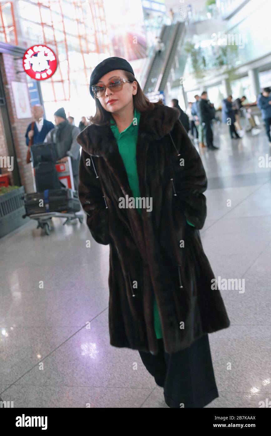 Hong Kong actress Sheren Tang shows up at a Beijing airport before ...