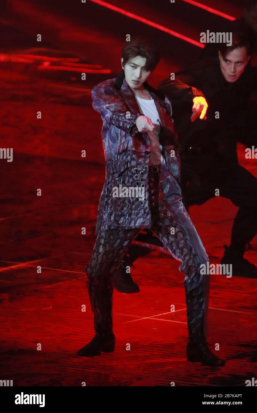 Chinese singer, dancer, rapper, and songwriter Cai Xukun or Kun holds ...