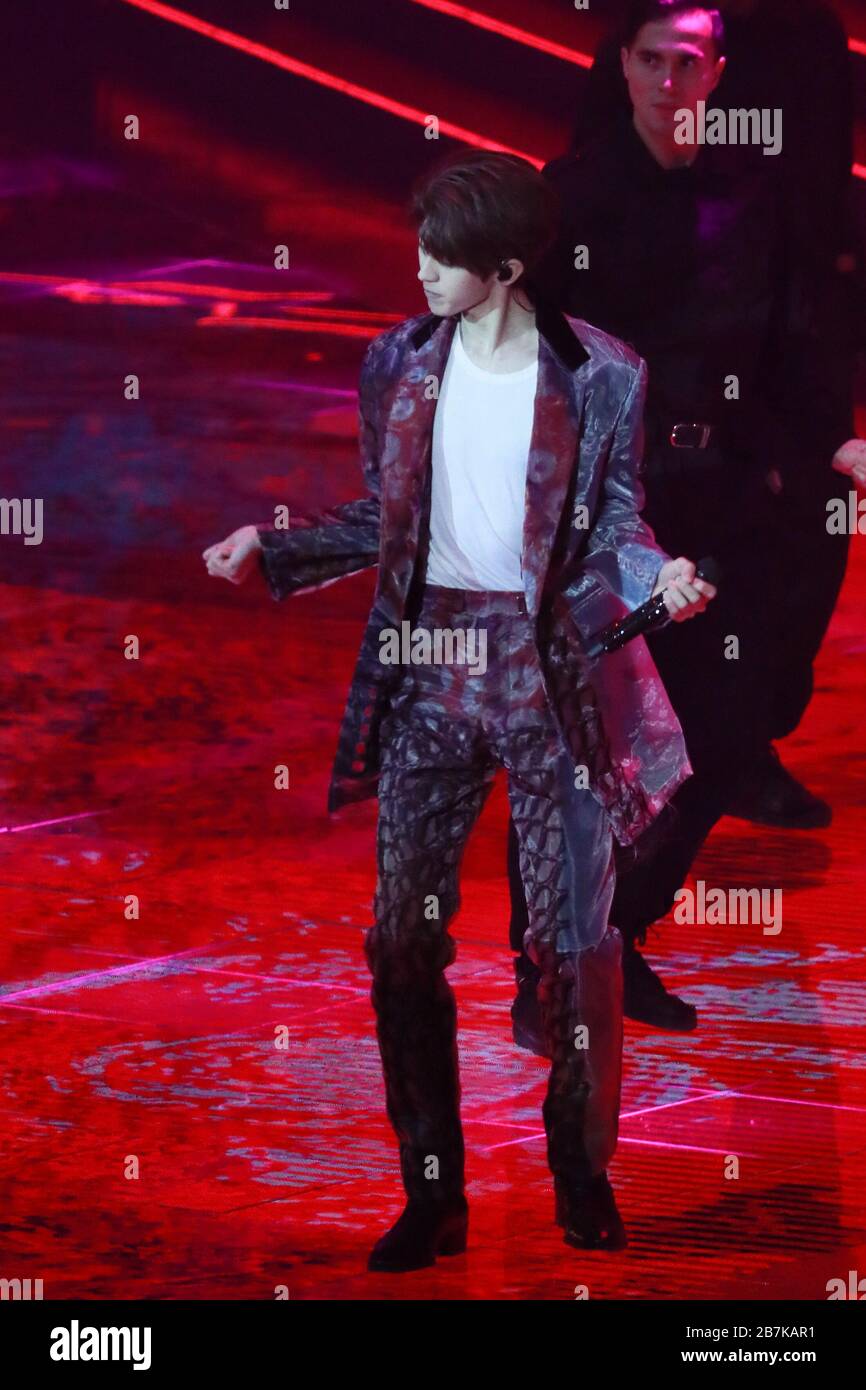 Chinese singer, dancer, rapper, and songwriter Cai Xukun or Kun holds ...