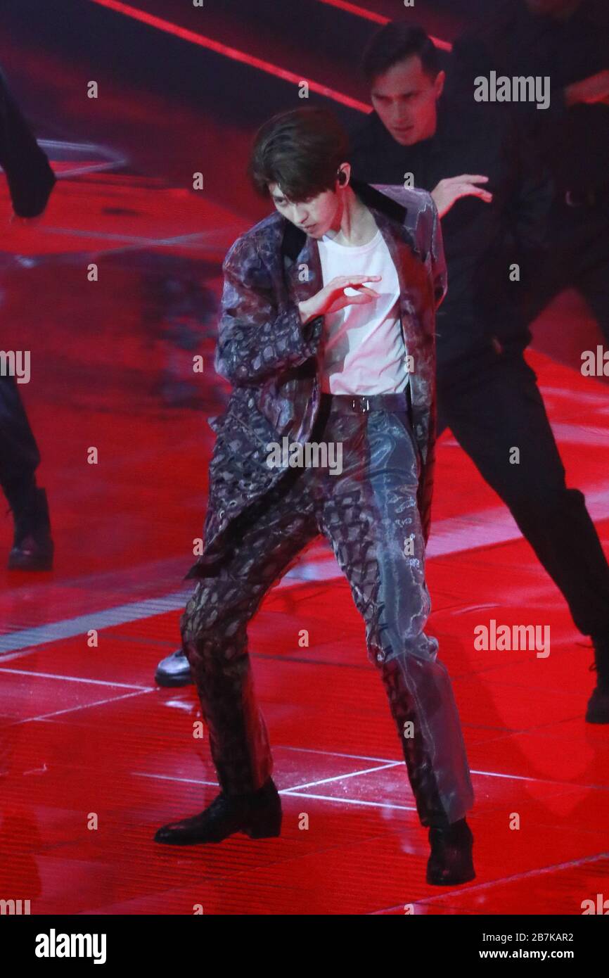 Chinese singer, dancer, rapper, and songwriter Cai Xukun or Kun holds ...