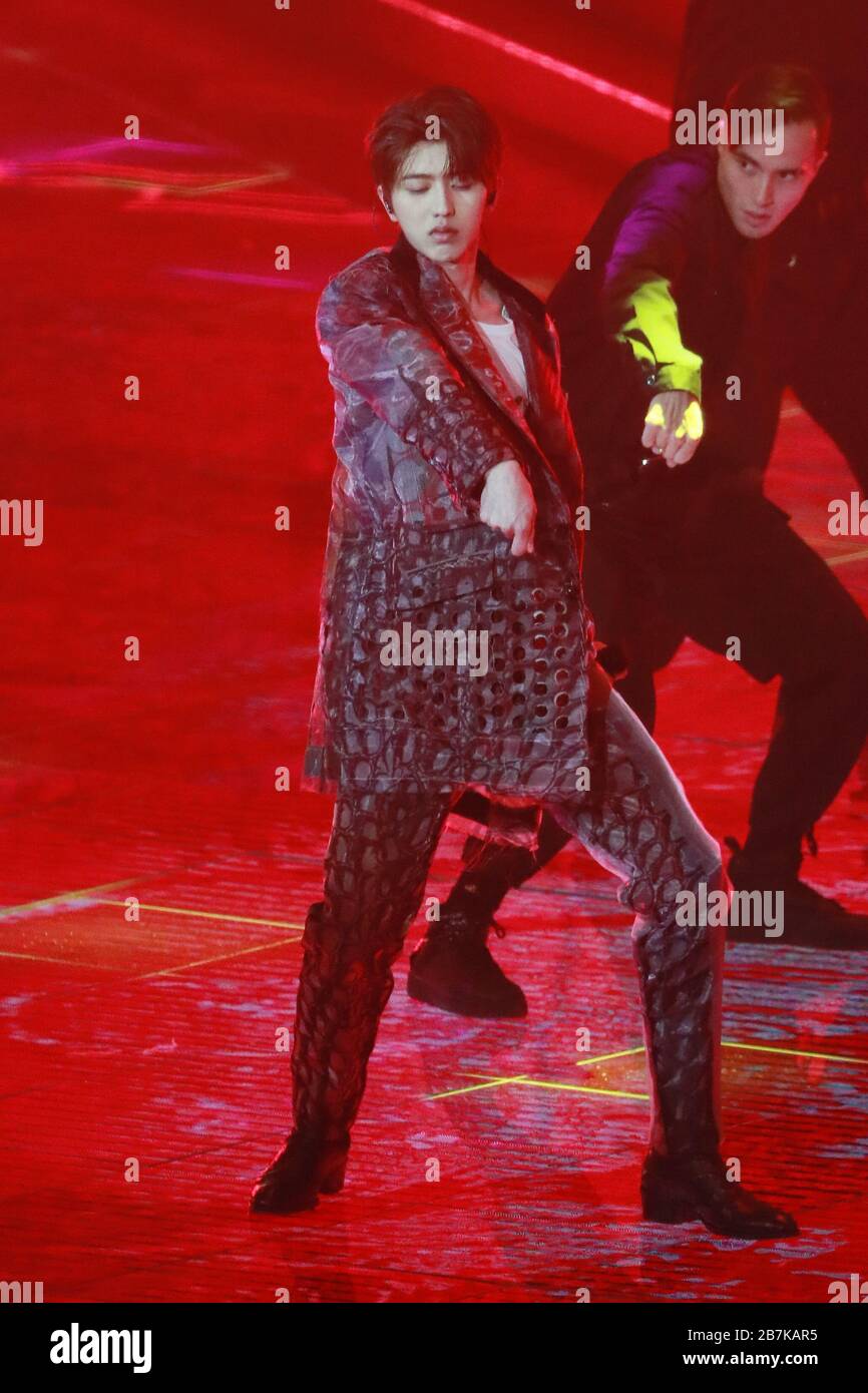 Chinese singer, dancer, rapper, and songwriter Cai Xukun or Kun holds ...