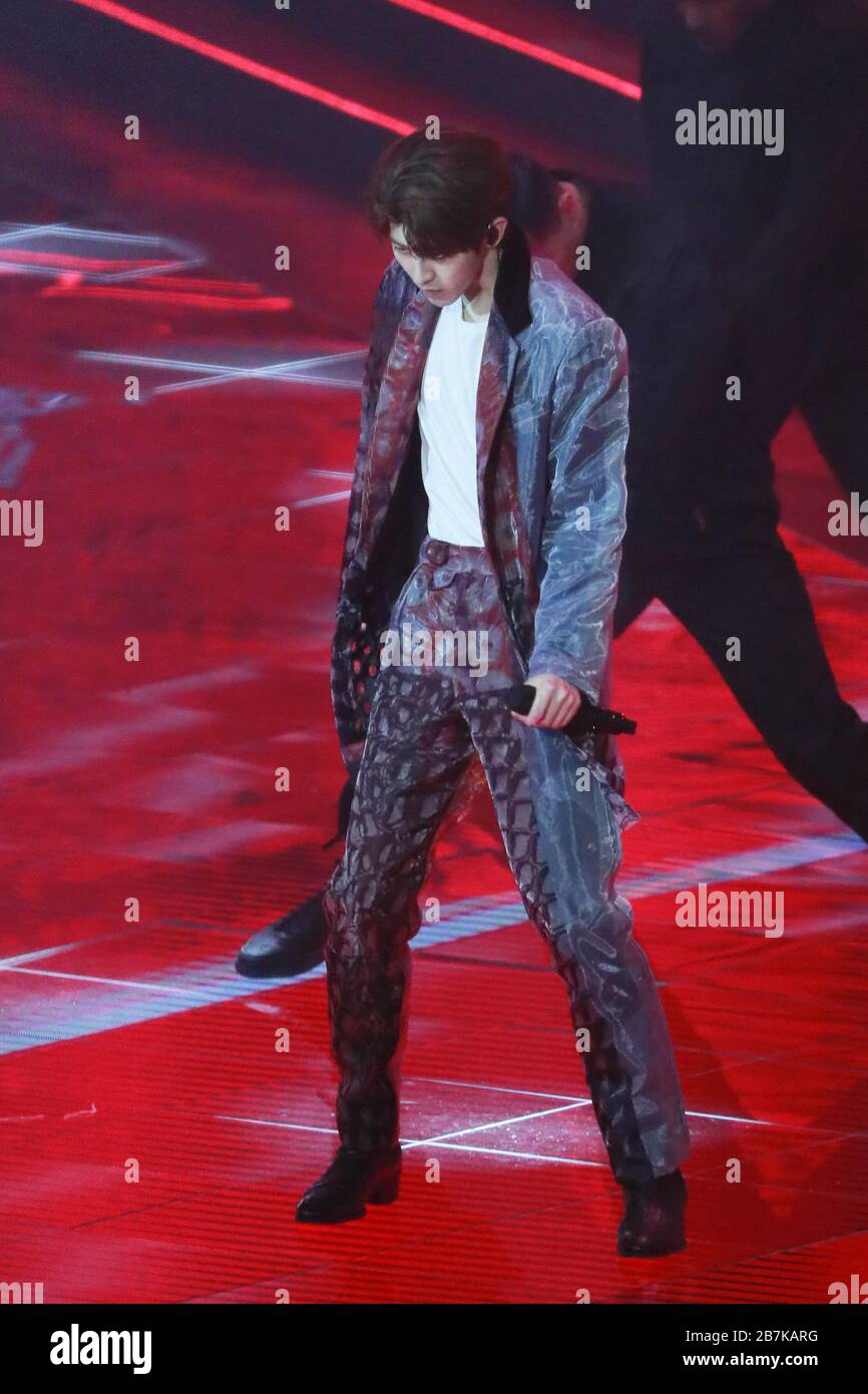 Chinese singer, dancer, rapper, and songwriter Cai Xukun or Kun holds ...