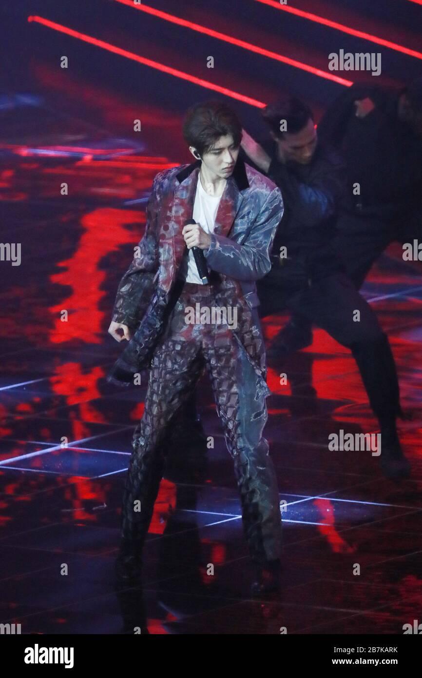 Chinese singer, dancer, rapper, and songwriter Cai Xukun or Kun holds ...
