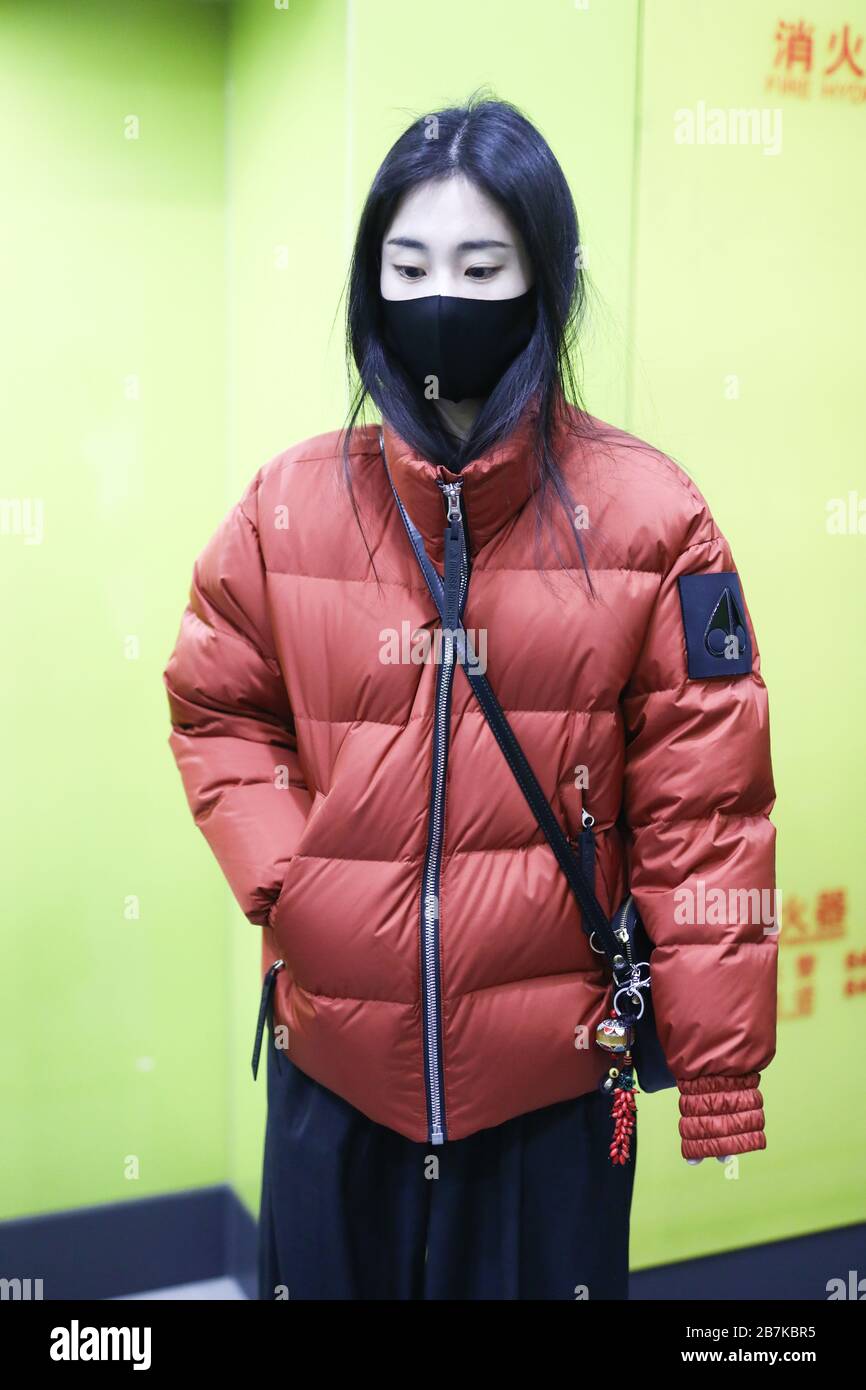Chinese singer Zhang Bichen or Diamond Zhang arrives at a Beijing ...