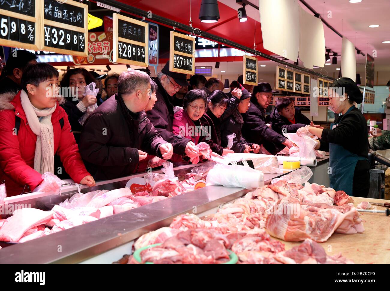 Citizens line to buy pork launched by local government, who released ...