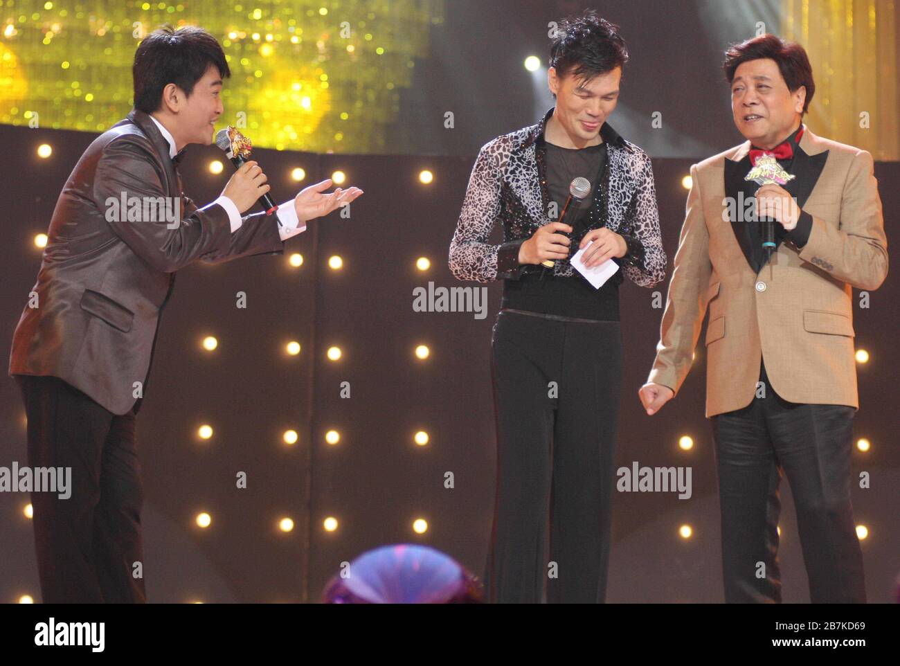 Chinese variety show host Jacky Wu, left, and Chinese host Li bin ...