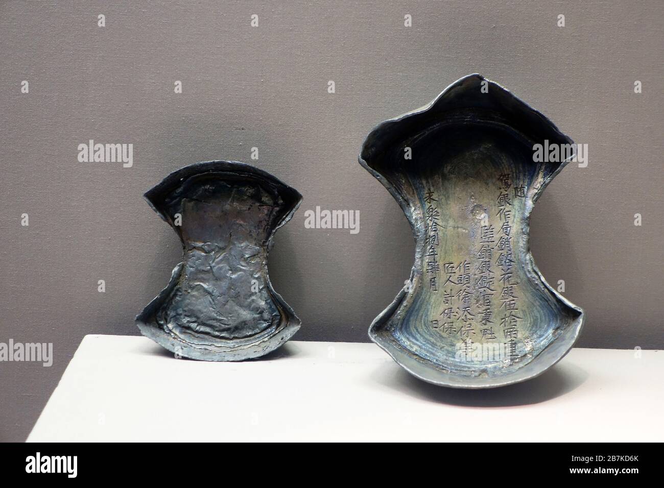 Ancient Chinese silver ingots or sycees of Ming Dynasty are on display ...