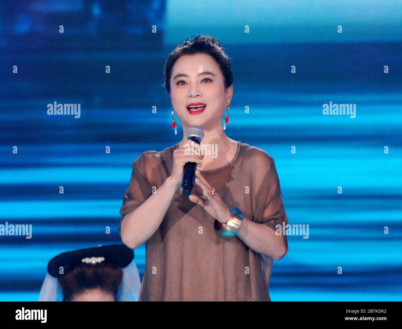 Chinese singer Li Lingyu attends CCTV New Year singing in Beijing ...