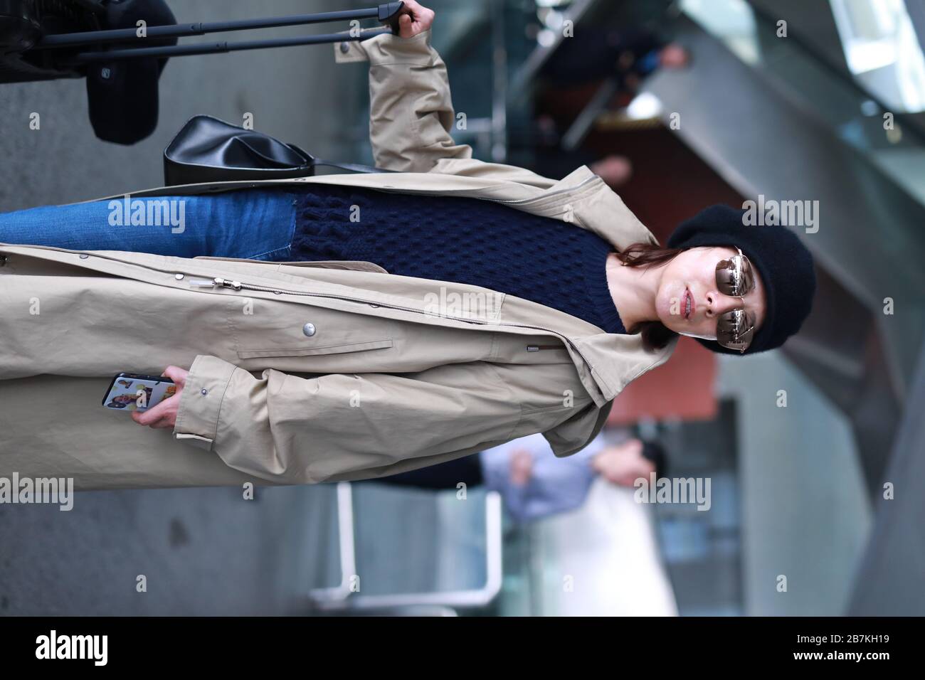 --File--In this undated photo, Chinese actress Hai Qing arrives at a ...