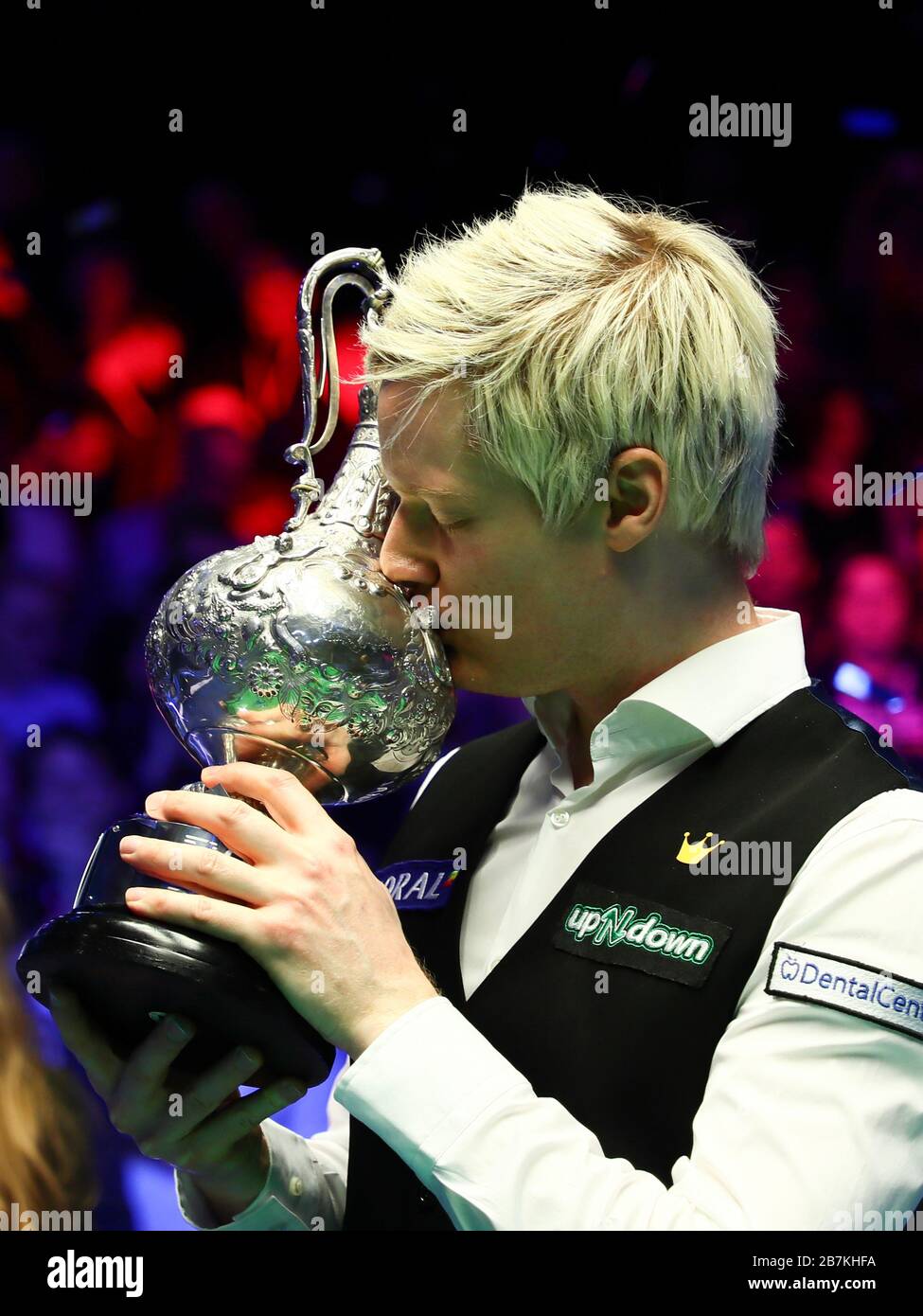 Neil Robertson of Australia kisses the trophy after winning the ...