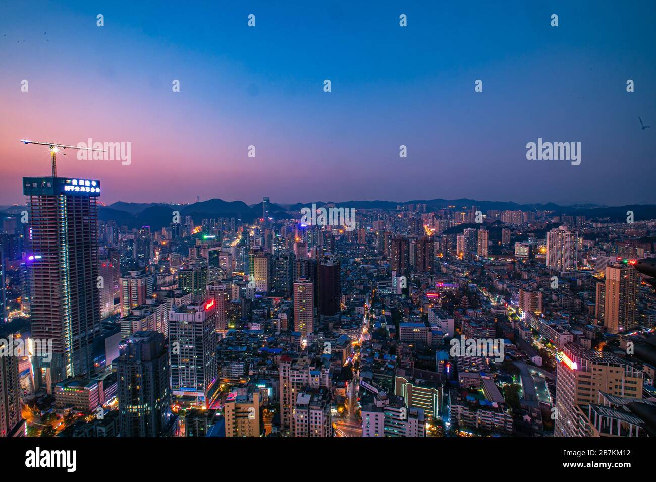 (Time-lapse photography) An aerial view of buildings standing at city ...
