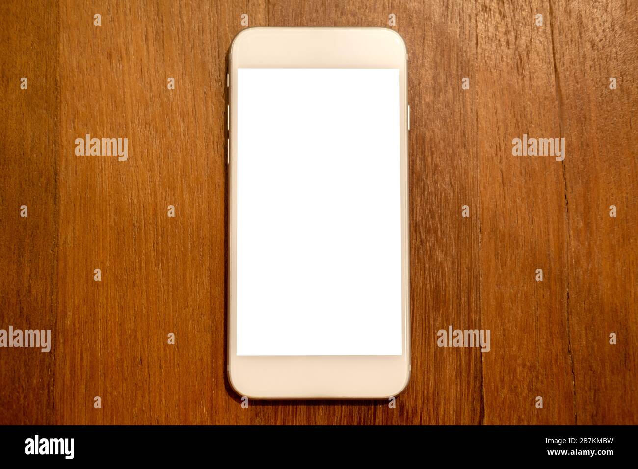 Top view mockup image of white mobile phone with blank desktop screen ...