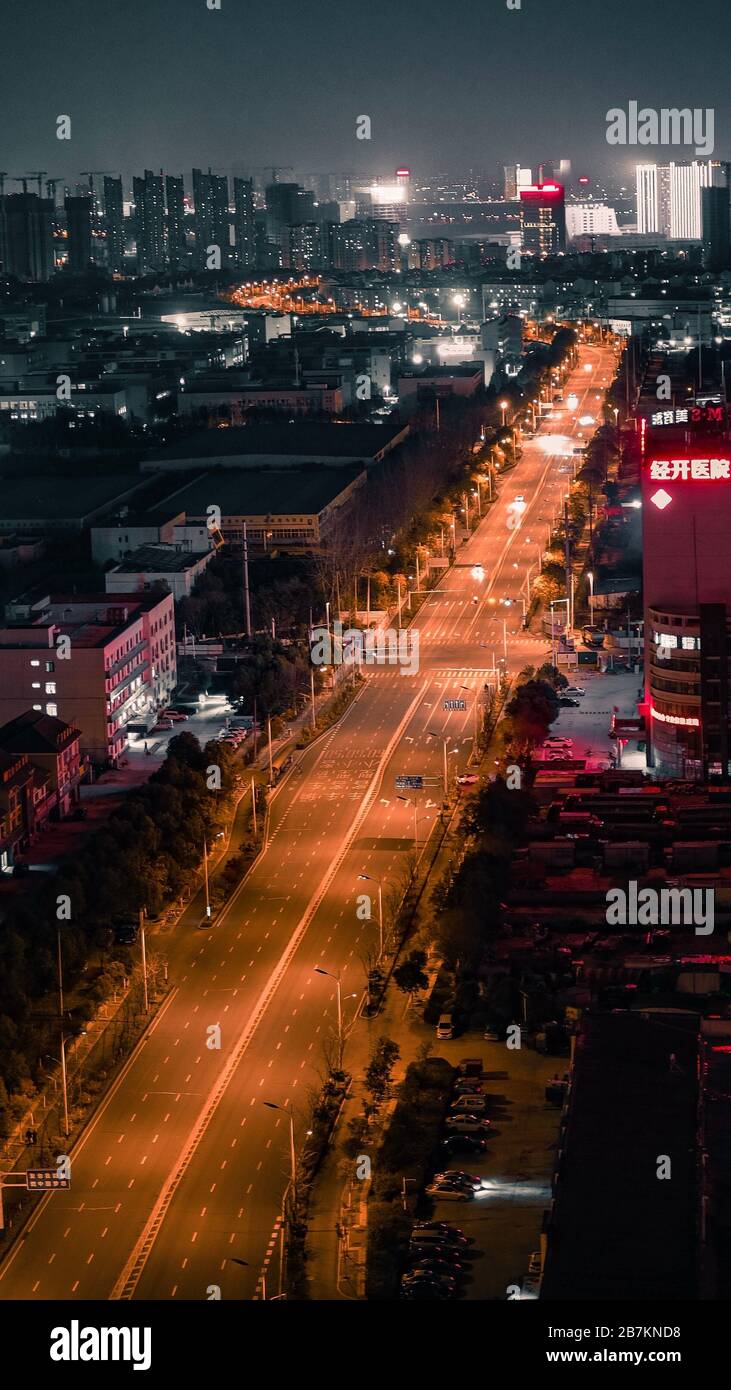 An aerial view of buildings erecting and vehicles moving at city center ...