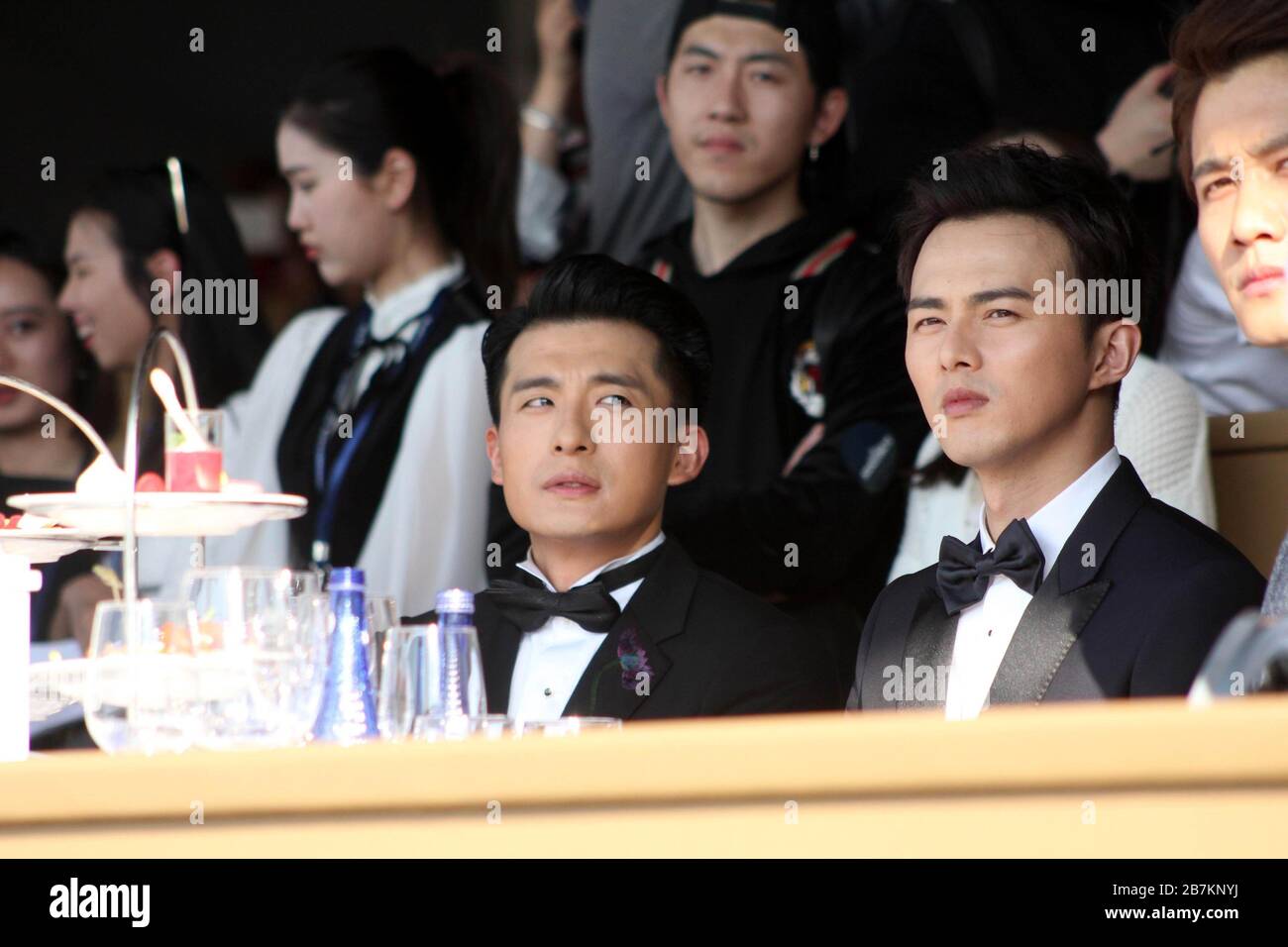 --FILE--Chinese actor Sun Yizhou, also known as Sean Sun, left, shows ...