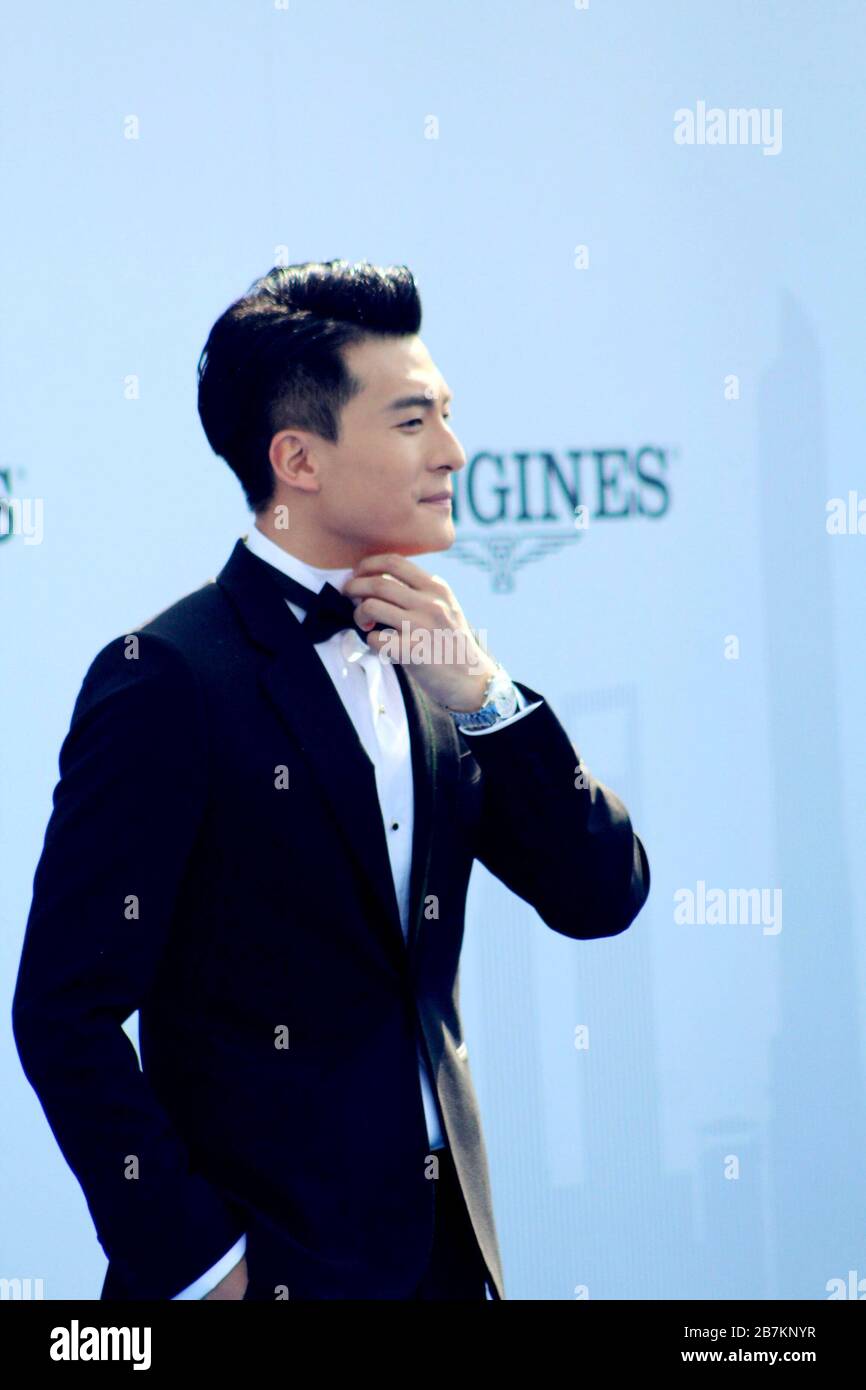 --FILE--Chinese actor Sun Yizhou, also known as Sean Sun, shows off ...