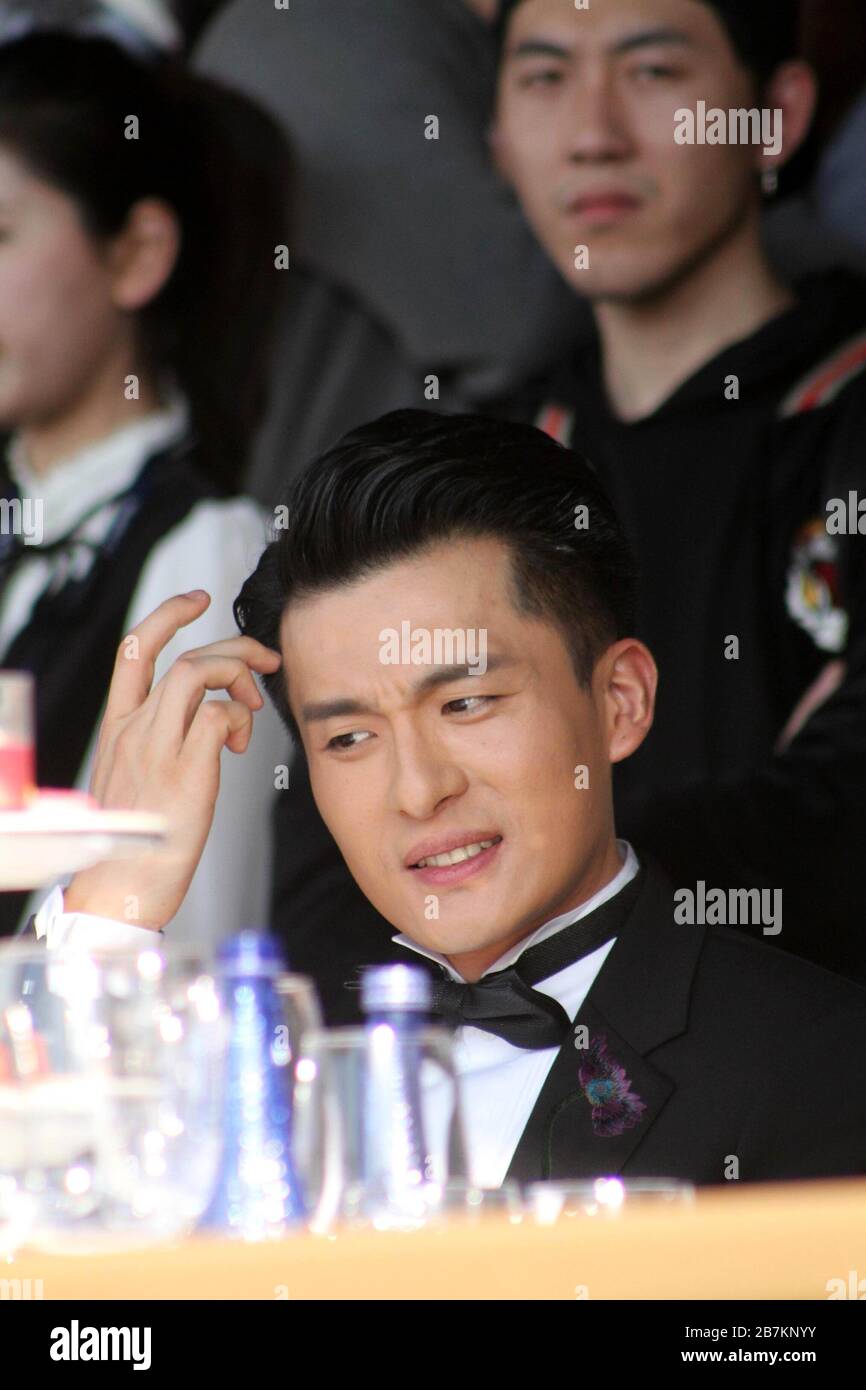 --FILE--Chinese actor Sun Yizhou, also known as Sean Sun, shows off ...