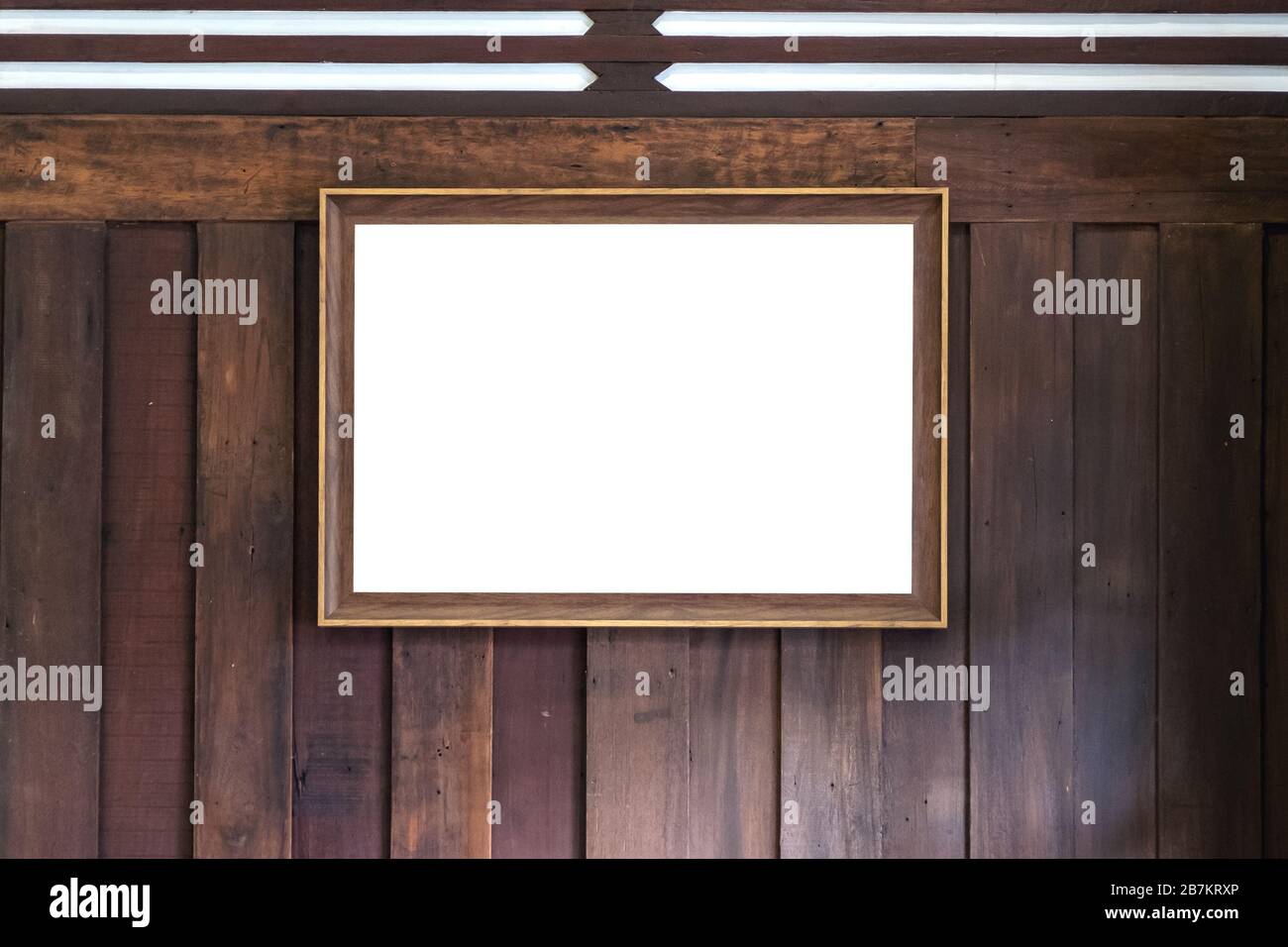 Mockup image of an antique golden picture frame with blank white screen ...