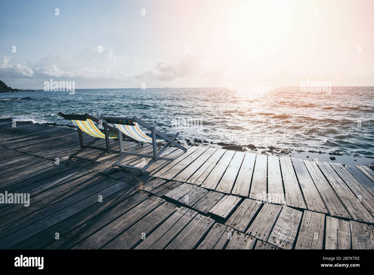 Terrace view of sea waves and coast landscape seascape rock with bench ...