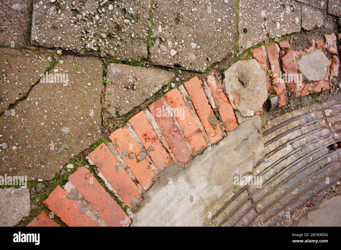 Vertical high angle shot of a cobblestone ground with different tiles ...