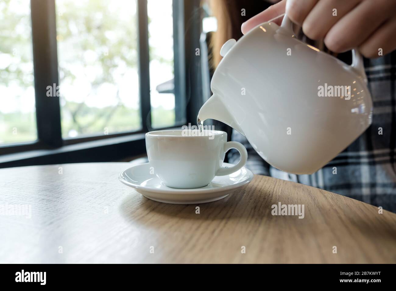 Holding teapot hi-res stock photography and images - Alamy