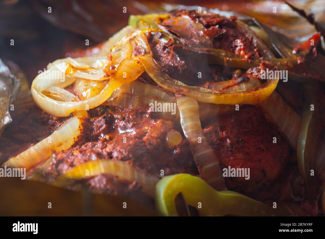 Pit roasted meat hi-res stock photography and images - Alamy