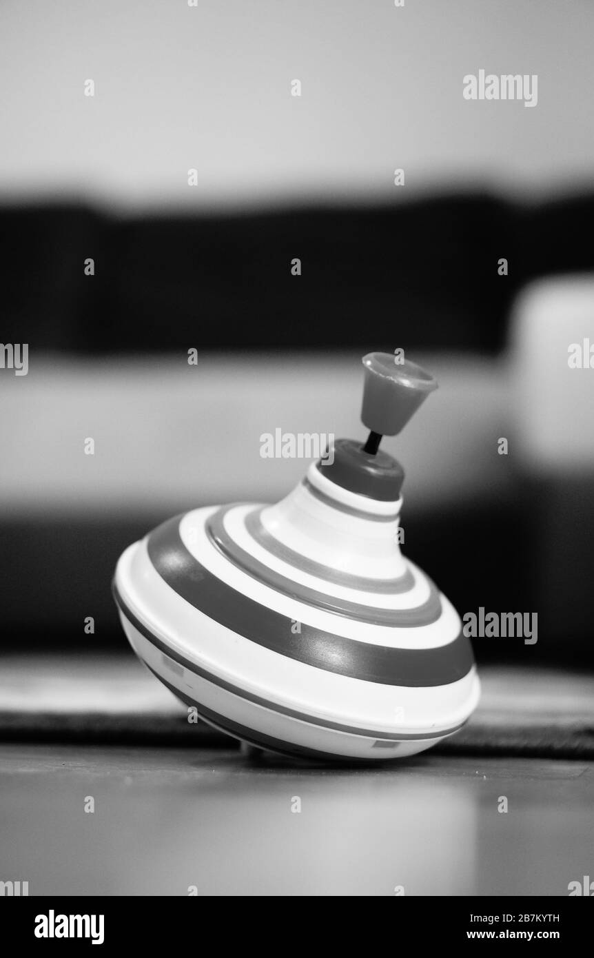 Wooden spinning top Black and White Stock Photos & Images - Alamy