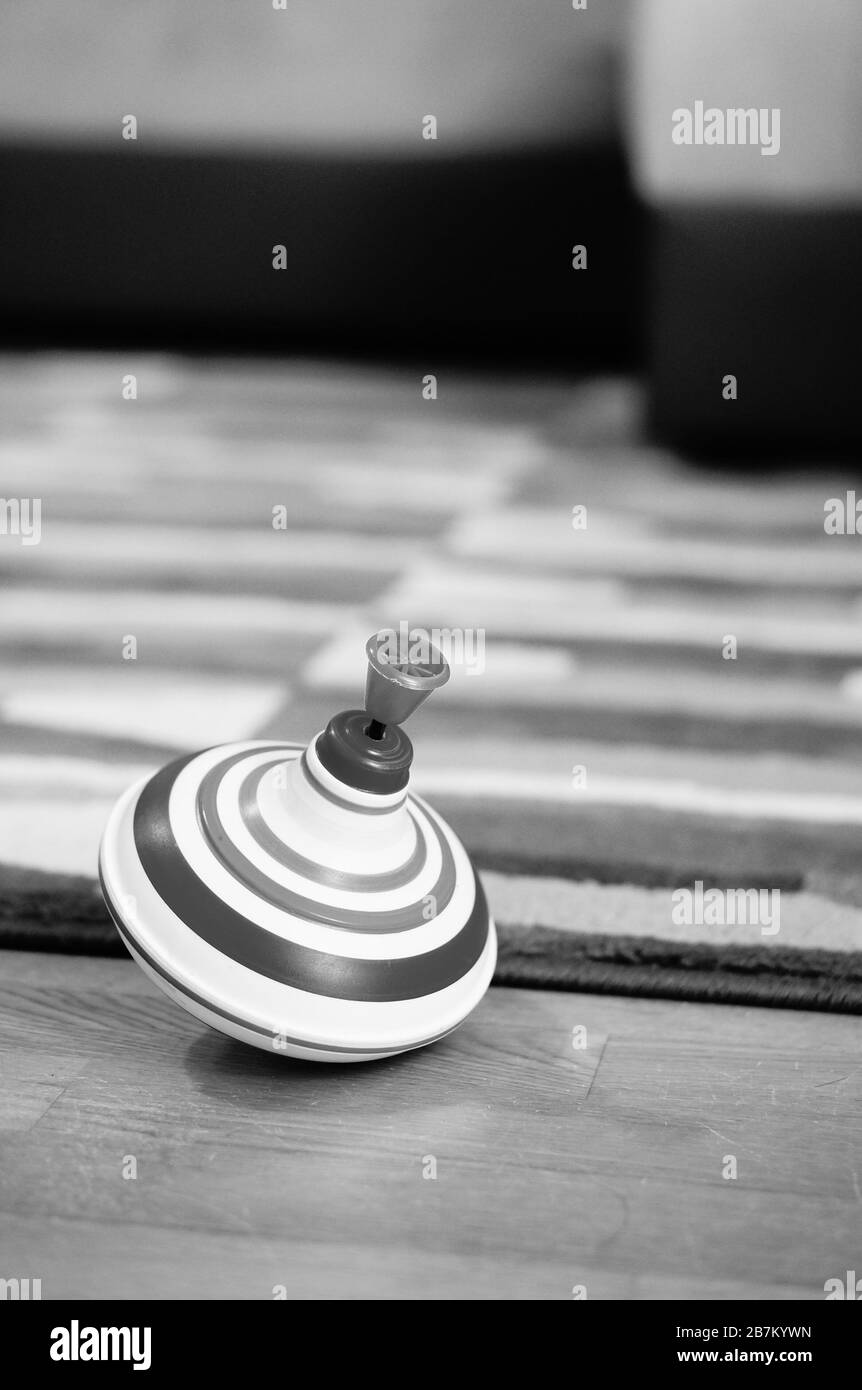 Wooden spinning top Black and White Stock Photos & Images - Alamy