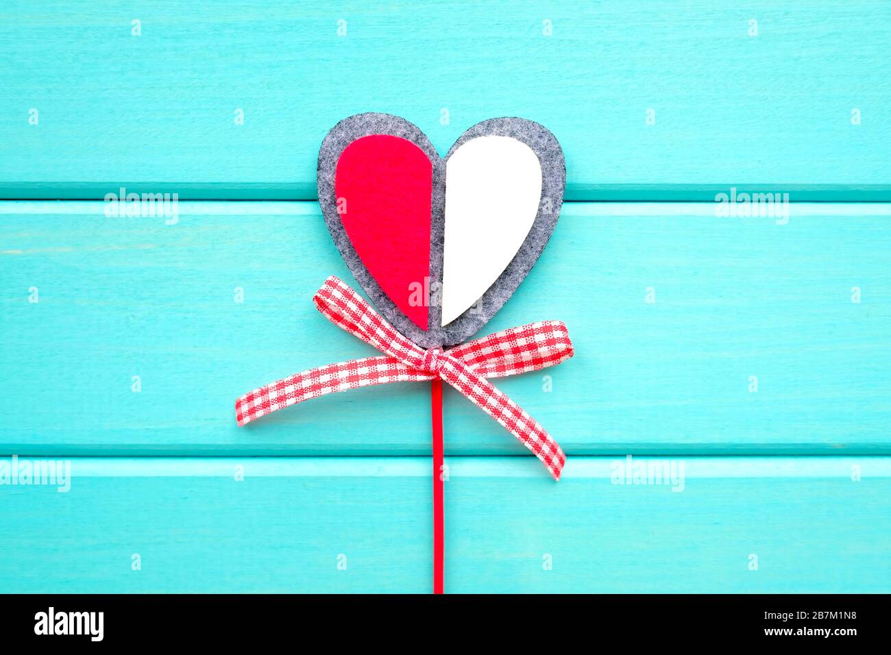 Decorative heart for Valentine's Day. Blue background. Typical ...