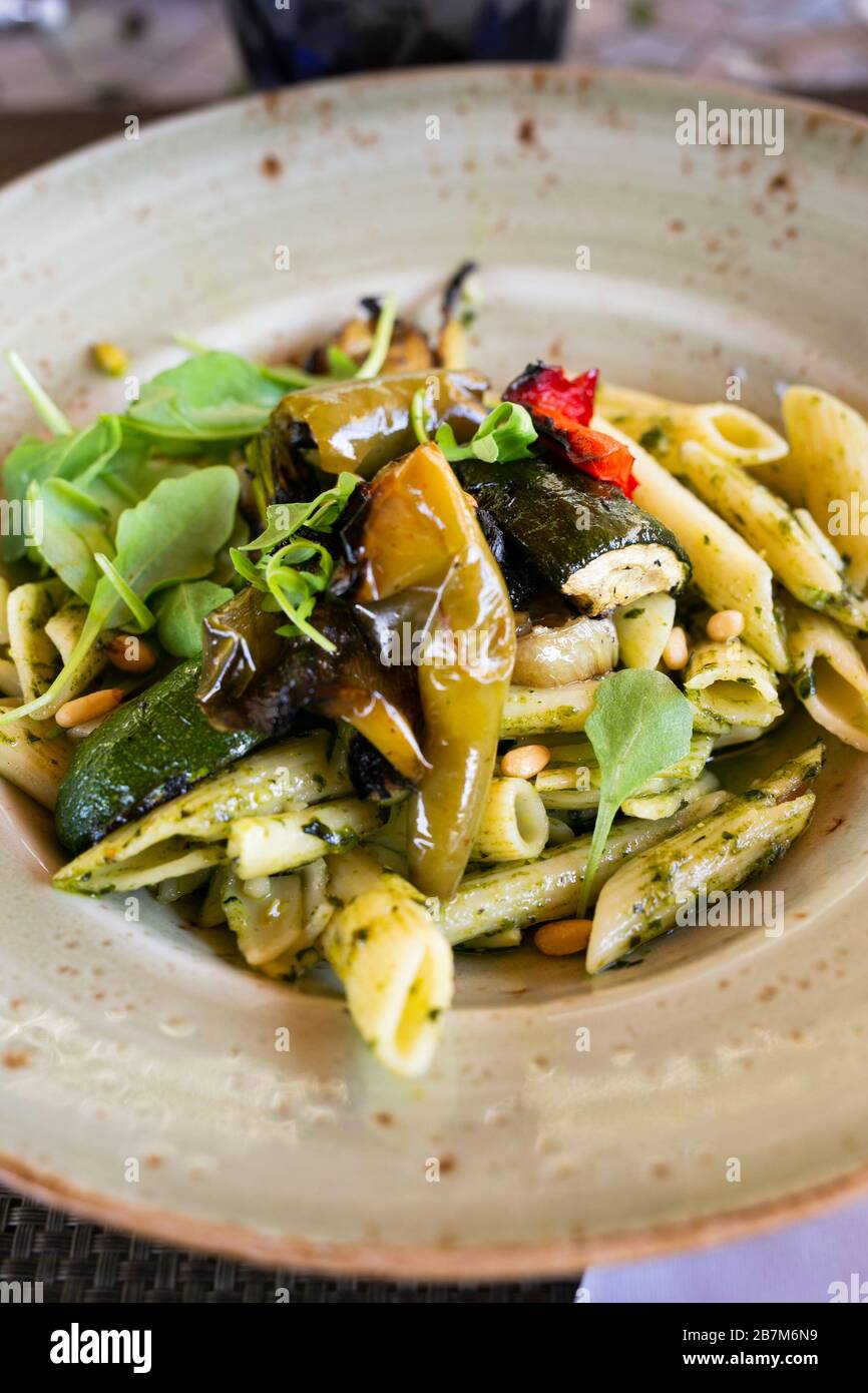 Penne al pesto with roasted vegetables Stock Photo - Alamy