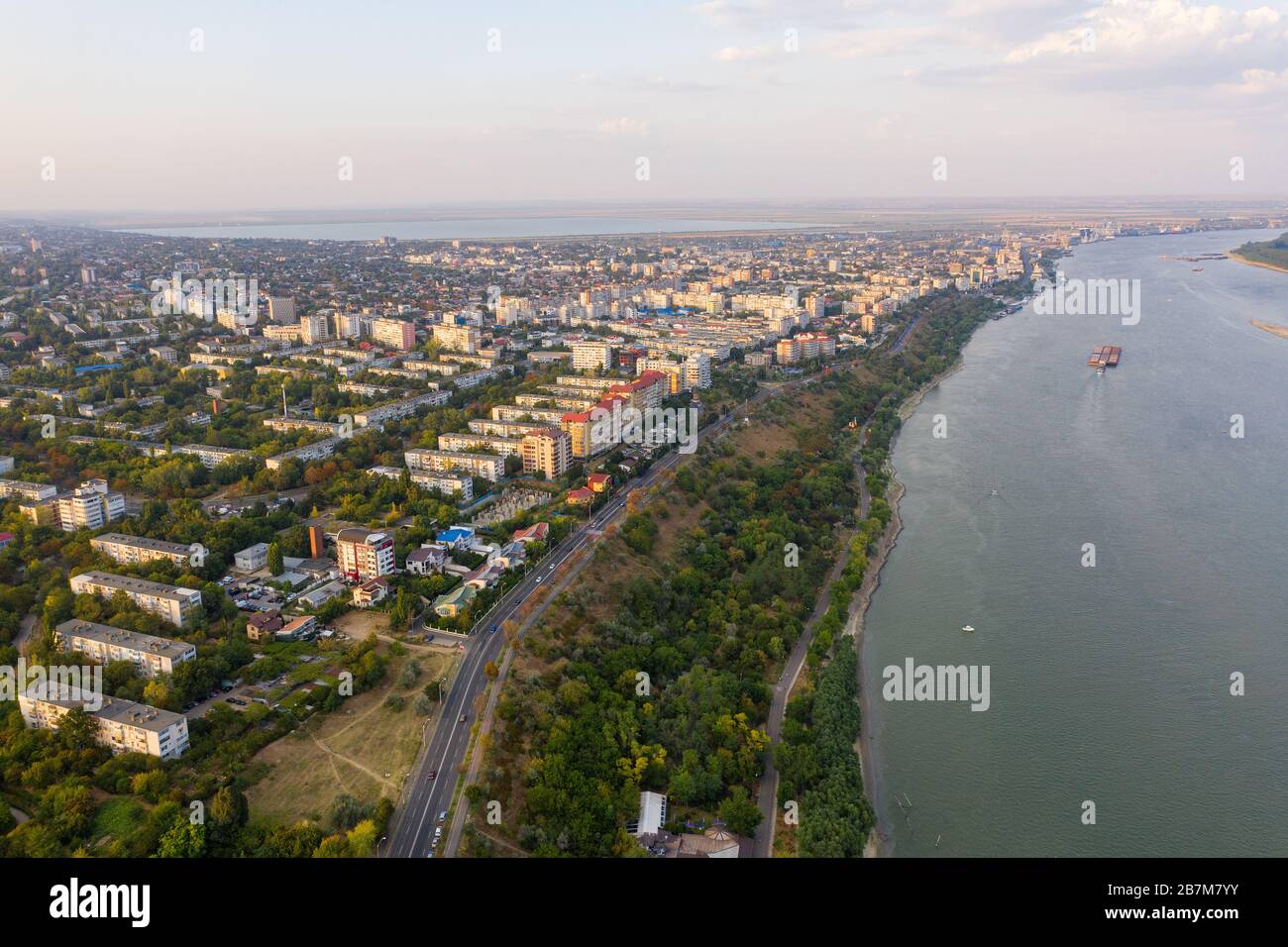 Aerial view of Galati City, Romania. Danube River near city with sunset ...