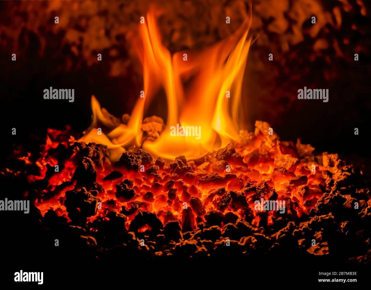 Coal fire with hot embers, close-up Stock Photo - Alamy