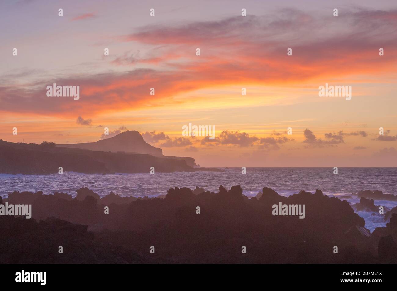 Lava stones on the beach of Piscinas Naturais Biscoitos. Atlantic Ocean ...