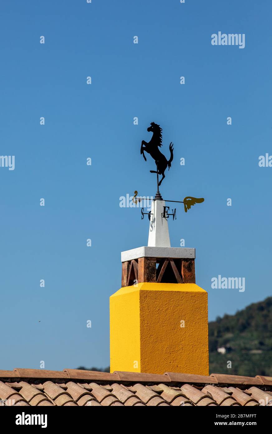Yellow chimneys decorated with artistic metalwork at Strada del ...