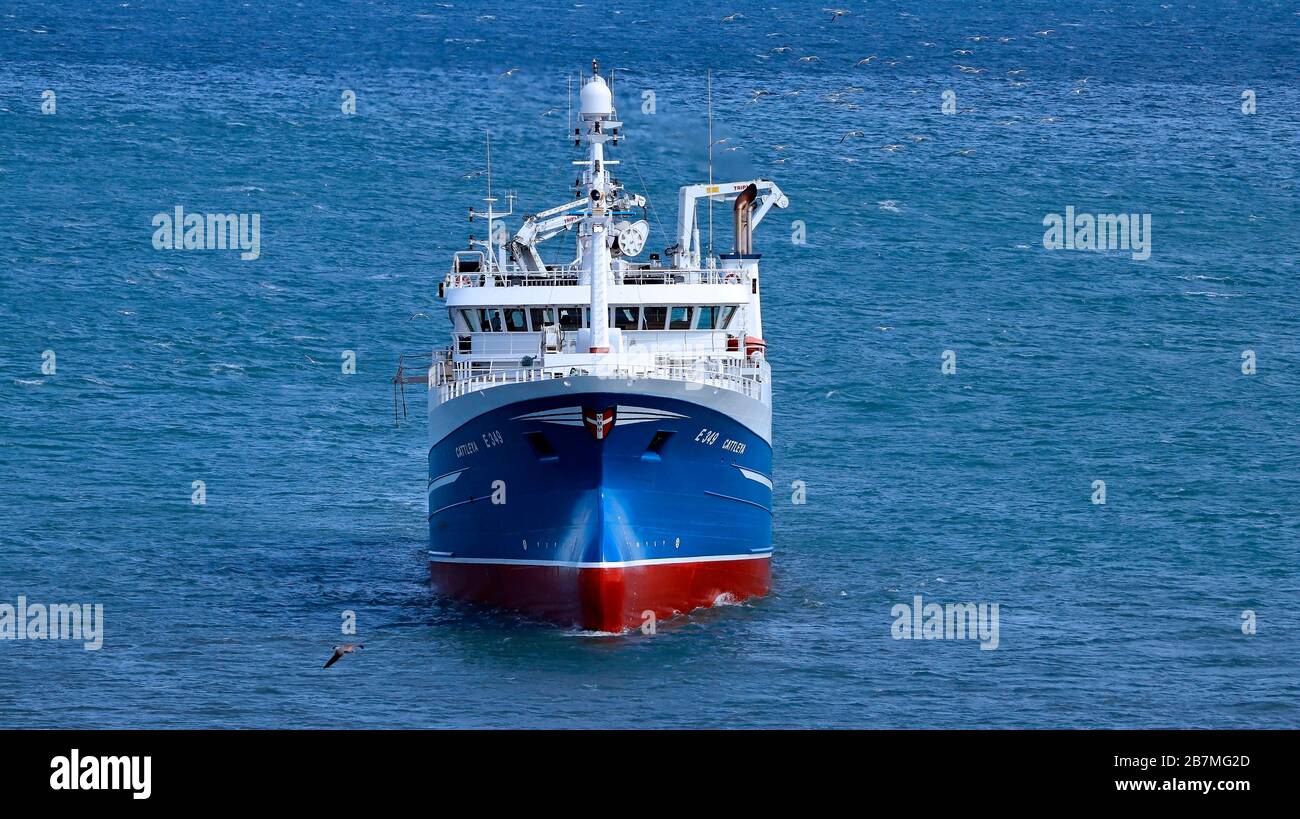 Deep Sea Trawler returning to the port of Skagen in Denmark Stock Photo ...