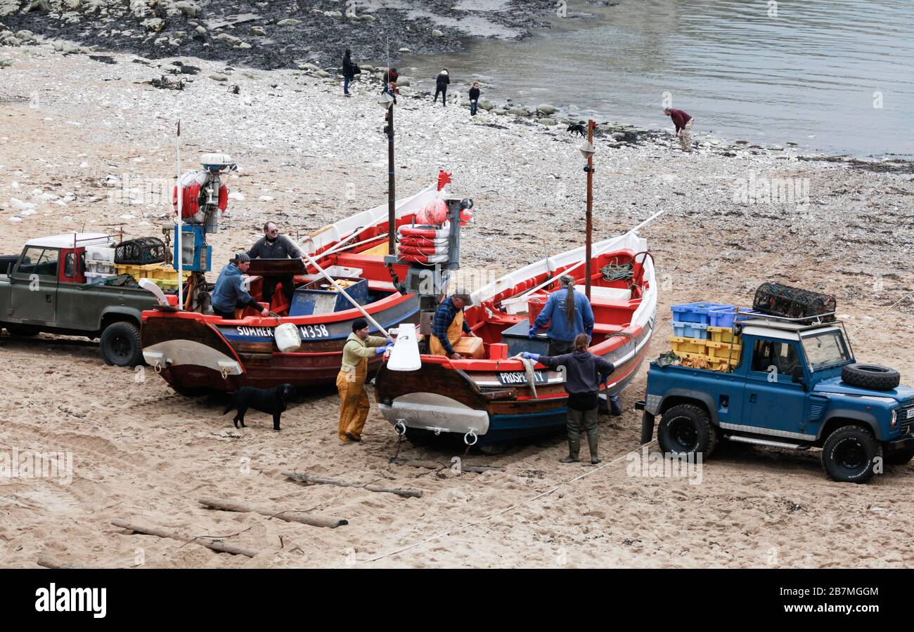 A pair of traditional Yorkshire cobble open fishing boats being ...