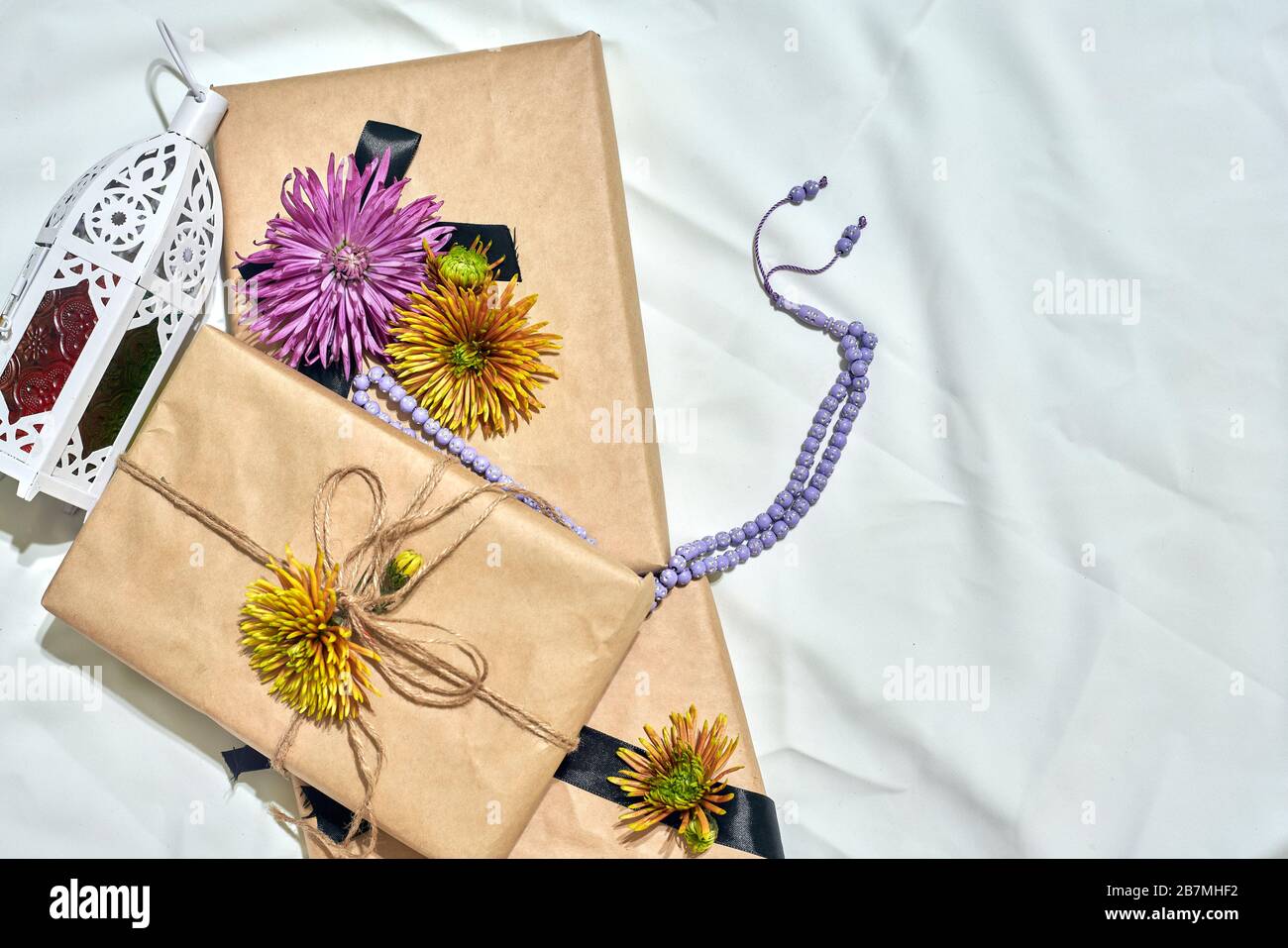 Arabic family giving gift hi-res stock photography and images - Alamy