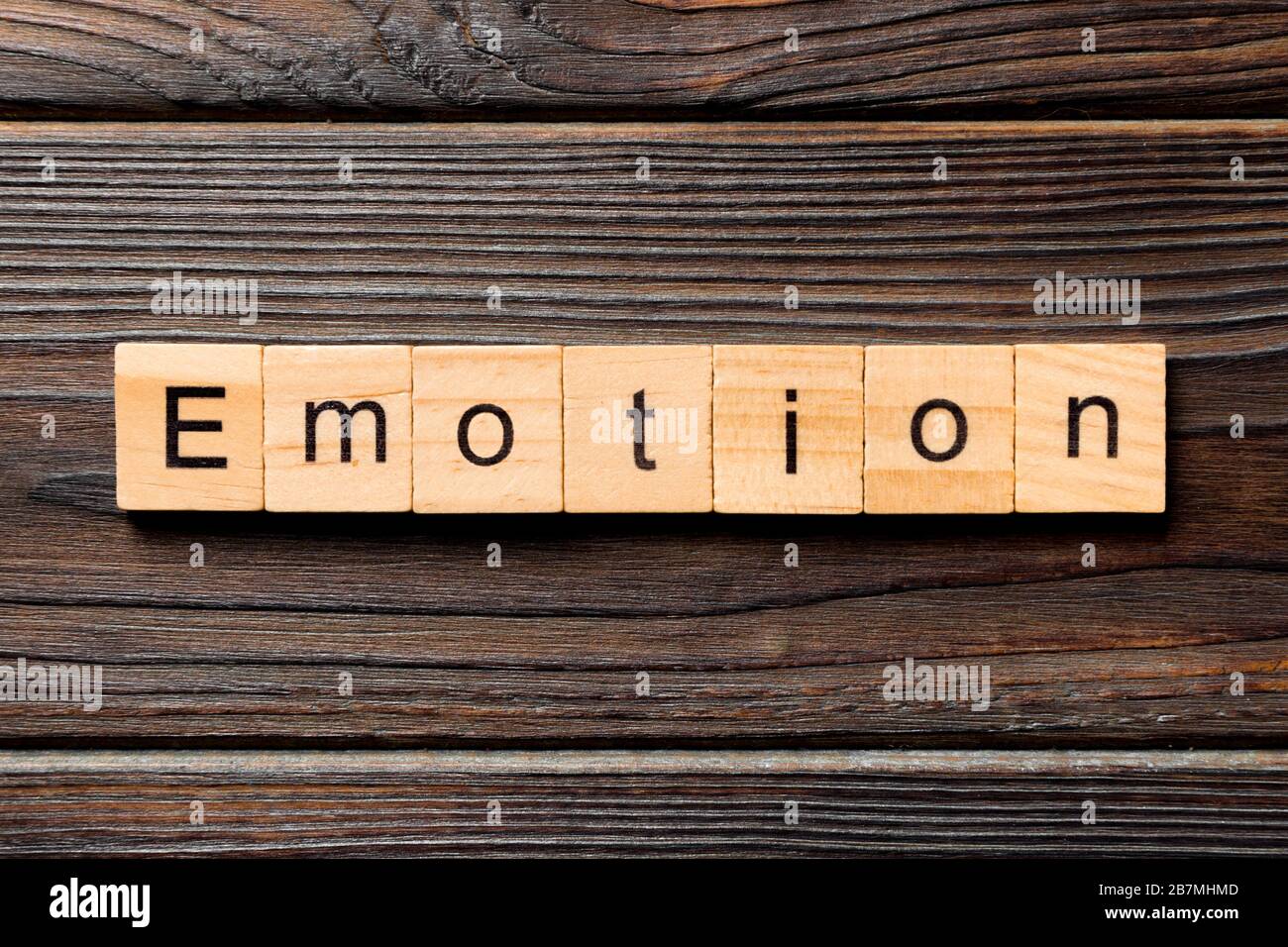 emotion word written on wood block. emotion text on table, concept ...