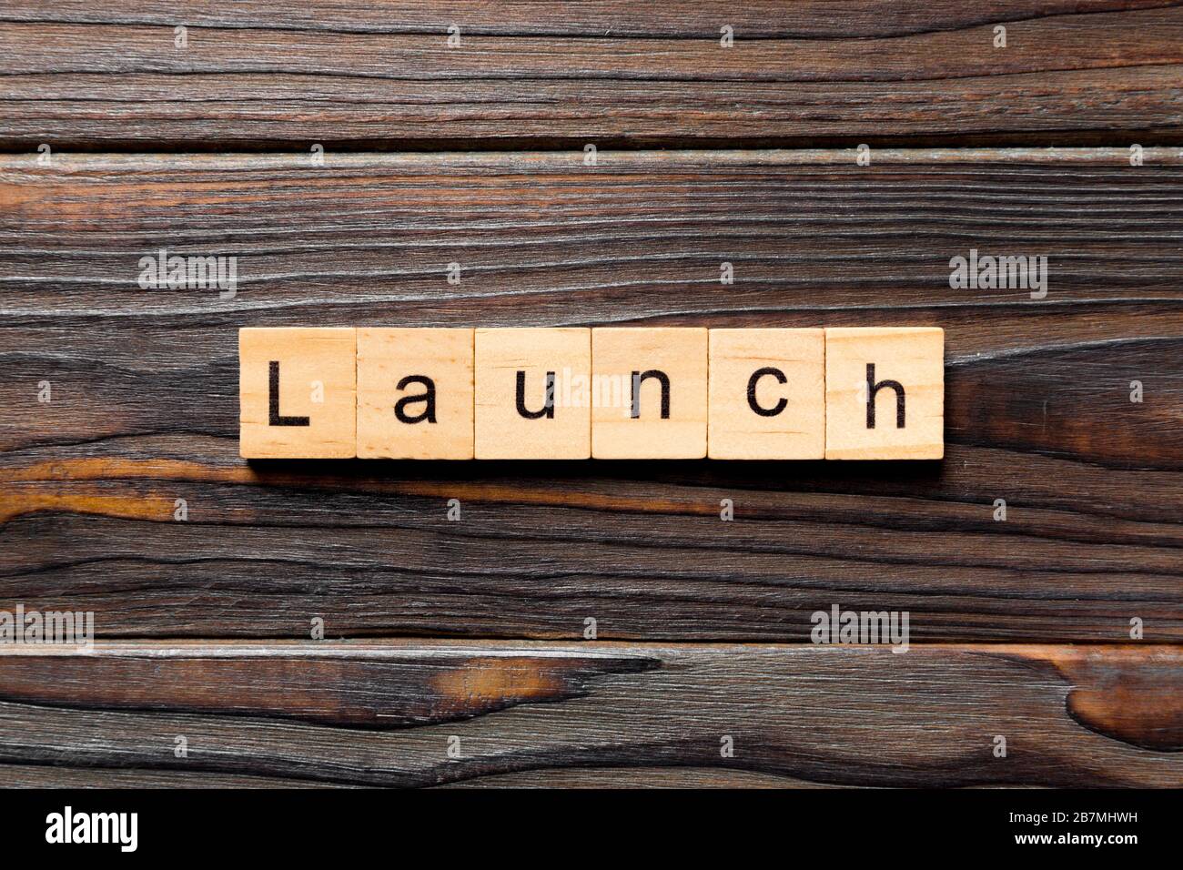 launch word written on wood block. launch text on table, concept Stock ...