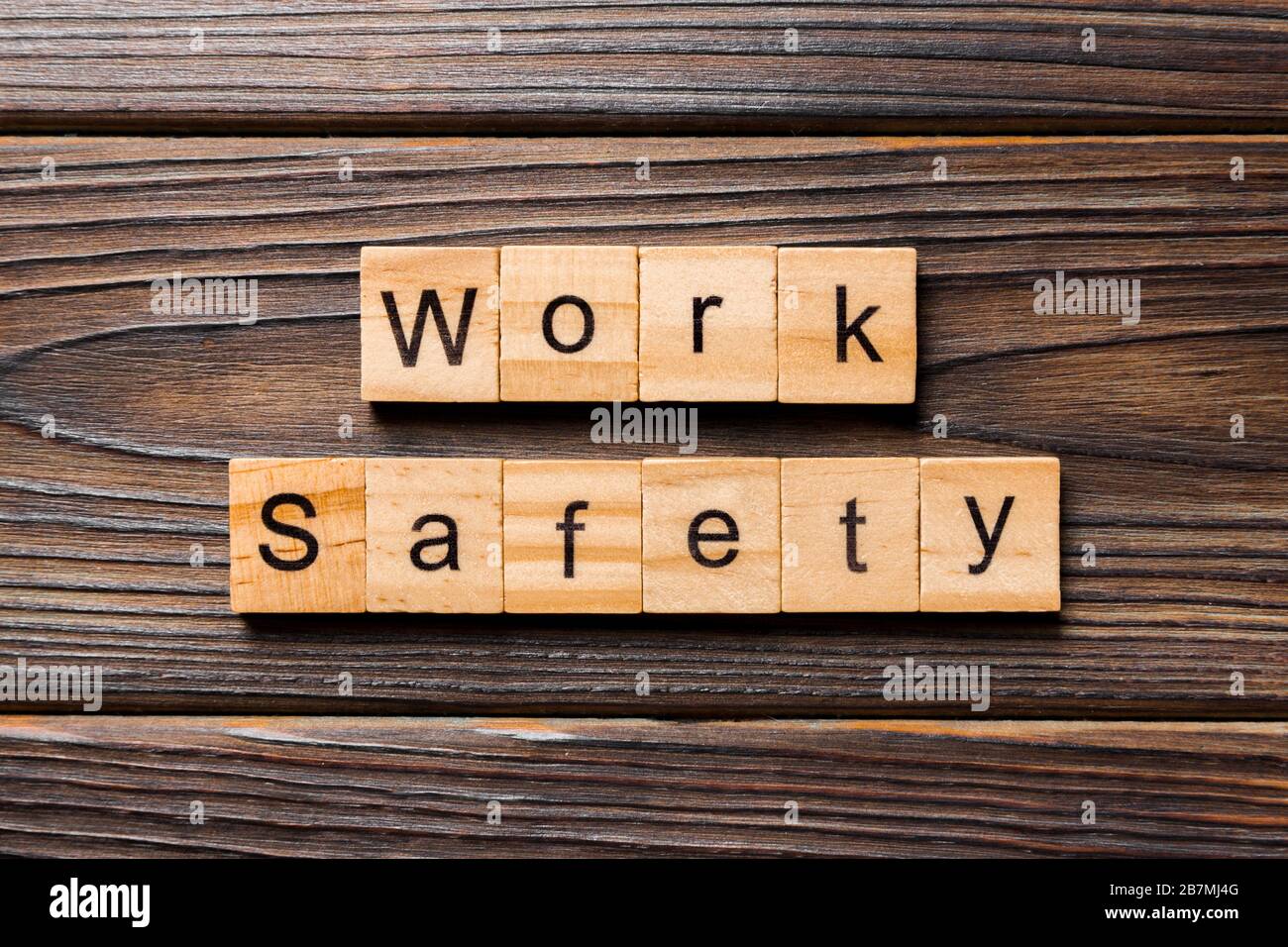 work safety word written on wood block. work safety text on table ...