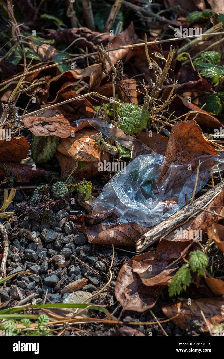 Plastic waste thrown away in the middle of nature Stock Photo - Alamy