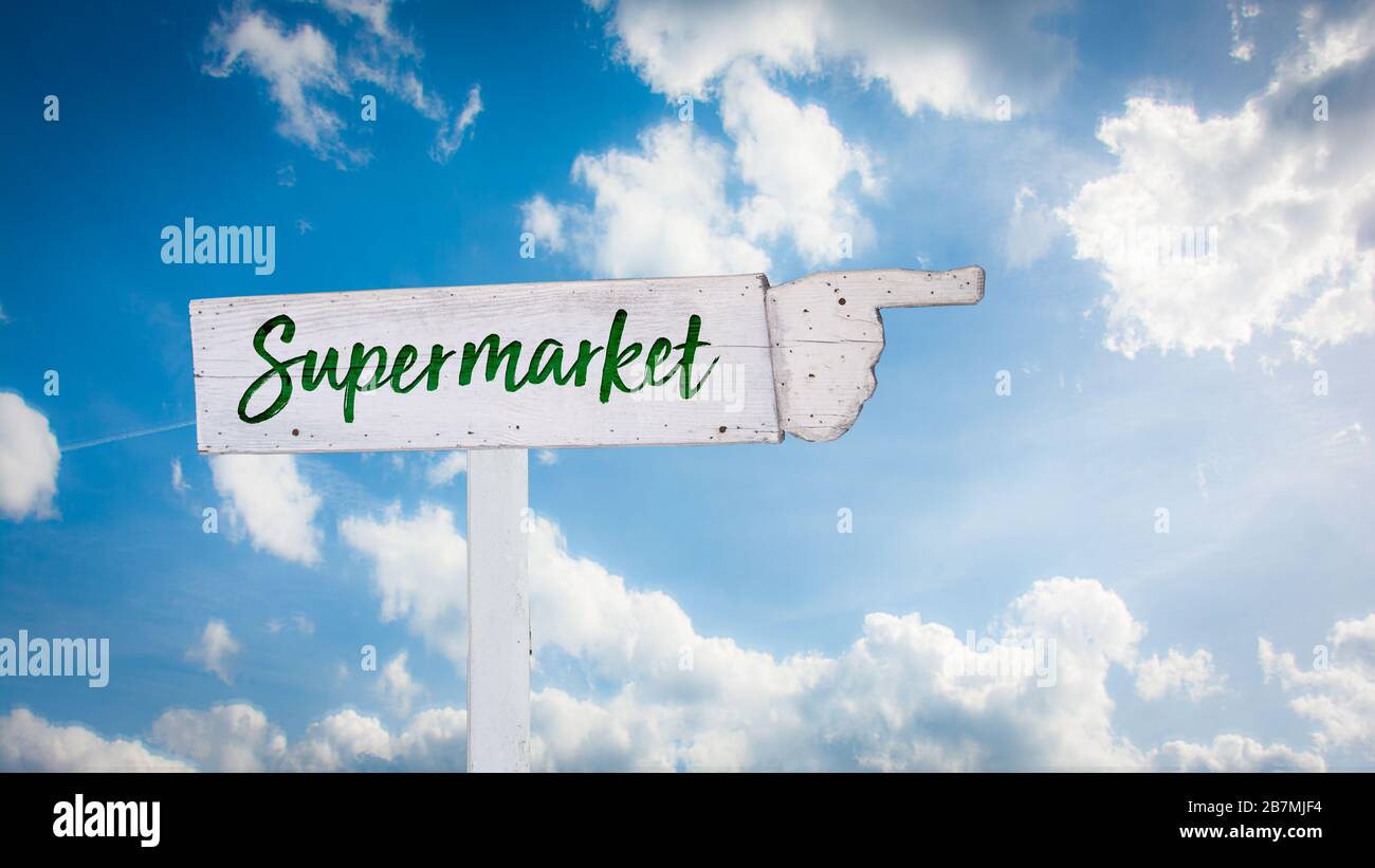 Street Sign the Direction Way to Supermarket Stock Photo - Alamy
